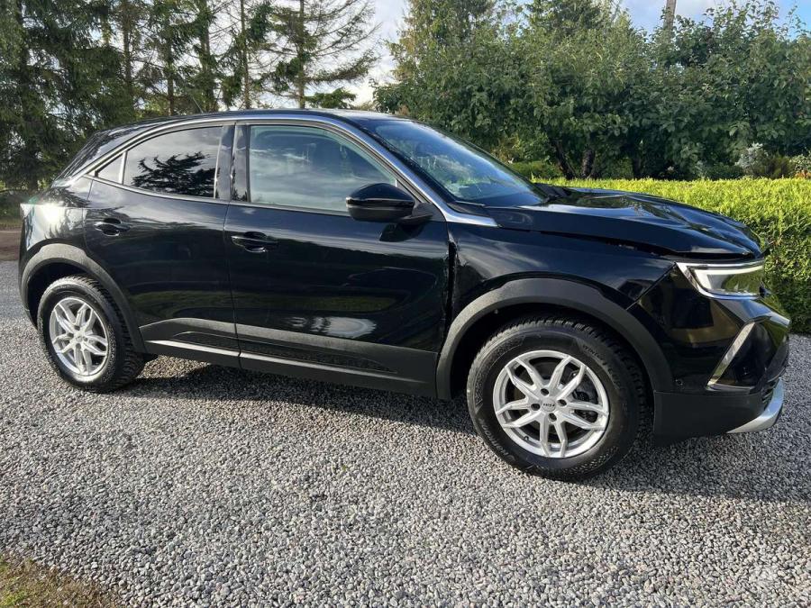 Black Opel Mokka 2022 in Kaunas, with an engine capacity of 0.00 L and mileage of 63 thousand km for 7850 €, photo 6 on AUTOMOTO.COM.LV