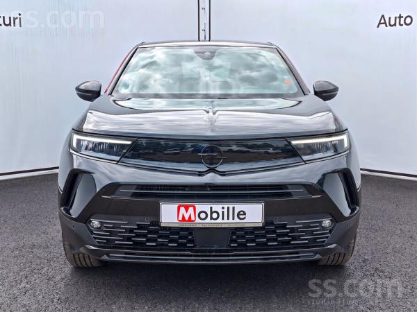 Black Opel Mokka 2022 in Riga, with an engine capacity of 1.20 L and mileage of 81 thousand km for 15900 €, photo 3 on AUTOMOTO.COM.LV