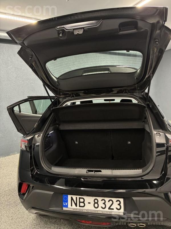 Black Opel Mokka 2022 in Riga, with an engine capacity of 1.20 L and mileage of 68 thousand km for 12500 €, photo 8 on AUTOMOTO.COM.LV