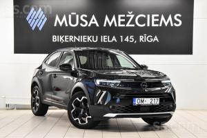 Black Opel Mokka 2022 in Riga, with an engine capacity of 1.20 L and mileage of 24 thousand km for 17990 €, photo 4 on AUTOMOTO.COM.LV