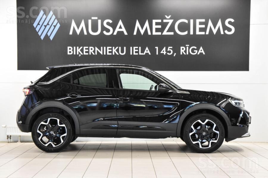 Black Opel Mokka 2022 in Riga, with an engine capacity of 1.20 L and mileage of 24 thousand km for 17990 €, photo 5 on AUTOMOTO.COM.LV
