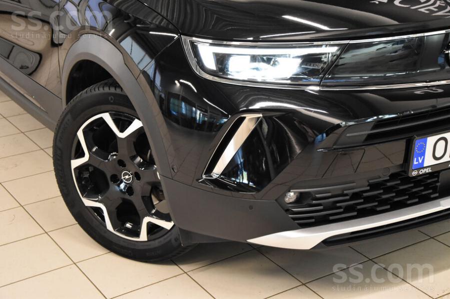 Black Opel Mokka 2022 in Riga, with an engine capacity of 1.20 L and mileage of 24 thousand km for 17990 €, photo 10 on AUTOMOTO.COM.LV