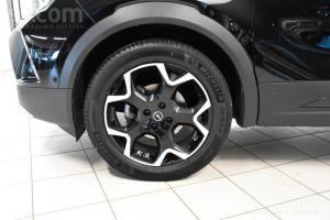 Black Opel Mokka 2022 in Riga, with an engine capacity of 1.20 L and mileage of 24 thousand km for 17990 €, photo 12 on AUTOMOTO.COM.LV