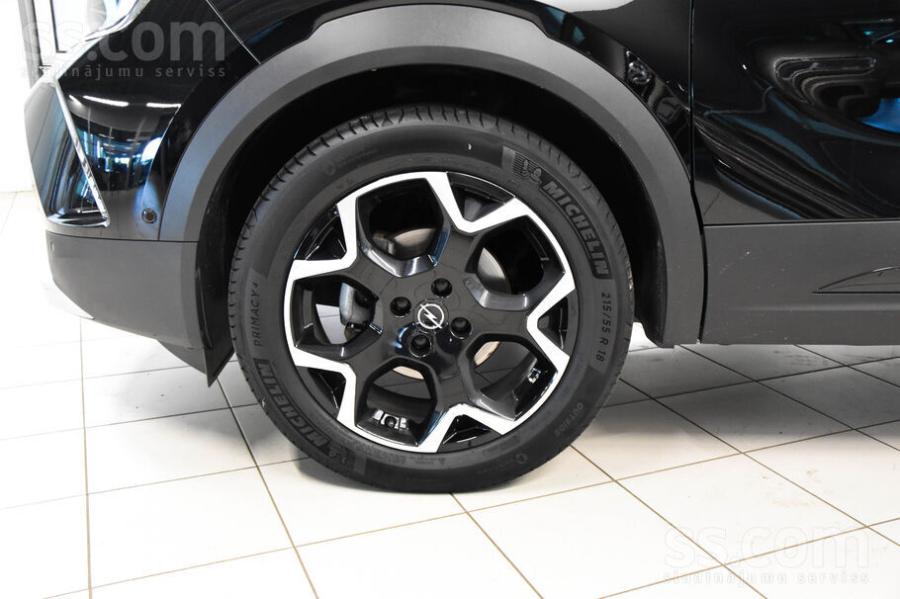 Black Opel Mokka 2022 in Riga, with an engine capacity of 1.20 L and mileage of 24 thousand km for 17990 €, photo 12 on AUTOMOTO.COM.LV