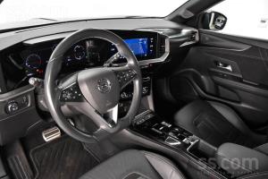 Black Opel Mokka 2022 in Riga, with an engine capacity of 1.20 L and mileage of 24 thousand km for 17990 €, photo 13 on AUTOMOTO.COM.LV
