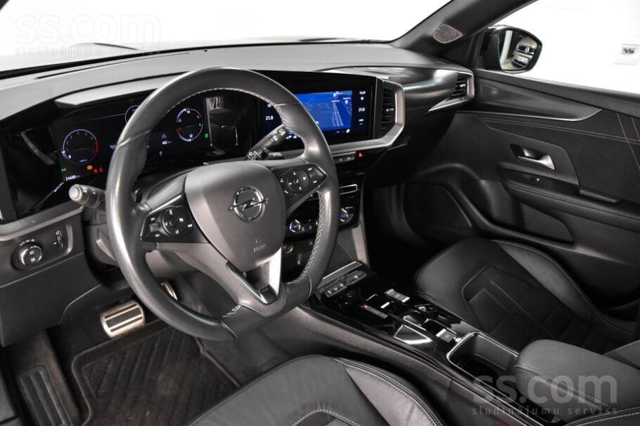 Black Opel Mokka 2022 in Riga, with an engine capacity of 1.20 L and mileage of 24 thousand km for 17990 €, photo 13 on AUTOMOTO.COM.LV