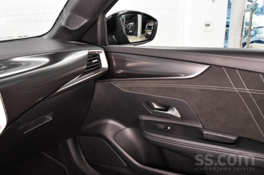 Black Opel Mokka 2022 in Riga, with an engine capacity of 1.20 L and mileage of 24 thousand km for 17990 €, photo 14 on AUTOMOTO.COM.LV