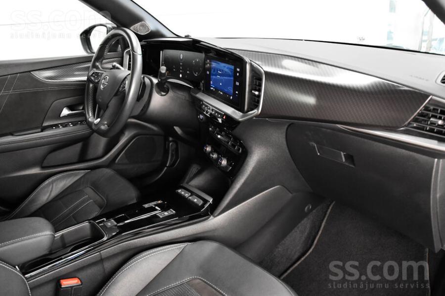 Black Opel Mokka 2022 in Riga, with an engine capacity of 1.20 L and mileage of 24 thousand km for 17990 €, photo 15 on AUTOMOTO.COM.LV