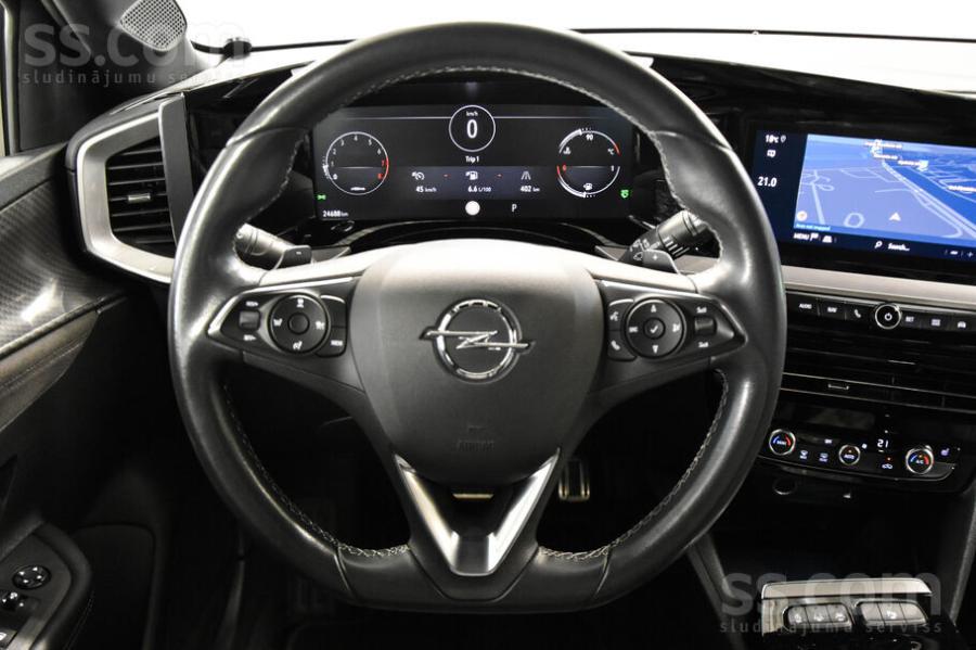 Black Opel Mokka 2022 in Riga, with an engine capacity of 1.20 L and mileage of 24 thousand km for 17990 €, photo 19 on AUTOMOTO.COM.LV