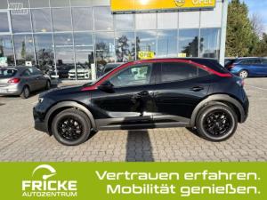 Black Opel Mokka 2023 in Kaunas, with an engine capacity of 1.20 L and mileage of 27 thousand km for 23368 €, photo 2 on AUTOMOTO.COM.LV