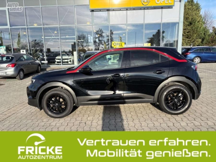 Black Opel Mokka 2023 in Kaunas, with an engine capacity of 1.20 L and mileage of 27 thousand km for 23368 €, photo 2 on AUTOMOTO.COM.LV