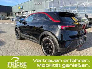 Black Opel Mokka 2023 in Kaunas, with an engine capacity of 1.20 L and mileage of 27 thousand km for 23368 €, photo 3 on AUTOMOTO.COM.LV