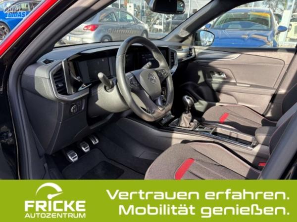 Black Opel Mokka 2023 in Kaunas, with an engine capacity of 1.20 L and mileage of 27 thousand km for 23368 €, photo 10 on AUTOMOTO.COM.LV