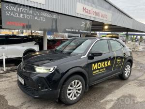 Black Opel Mokka 2023 in Riga, with an engine capacity of 1.20 L and mileage of 49 thousand km for 21600 €, photo  on AUTOMOTO.COM.LV