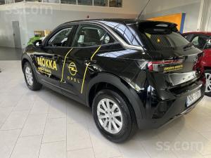 Black Opel Mokka 2023 in Riga, with an engine capacity of 1.20 L and mileage of 49 thousand km for 21600 €, photo 3 on AUTOMOTO.COM.LV