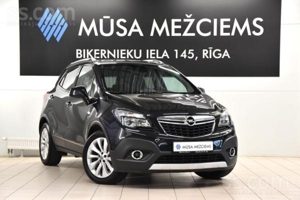 Black Opel Mokka 2016 in Riga, with an engine capacity of 1.60 L and mileage of 101 thousand km for 10990 €, photo 1 on AUTOMOTO.COM.LV