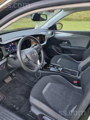 Black Opel Mokka 2021 in Riga, with an engine capacity of 1.60 L and mileage of 48 thousand km for 16000 €, photo 8 on AUTOMOTO.COM.LV