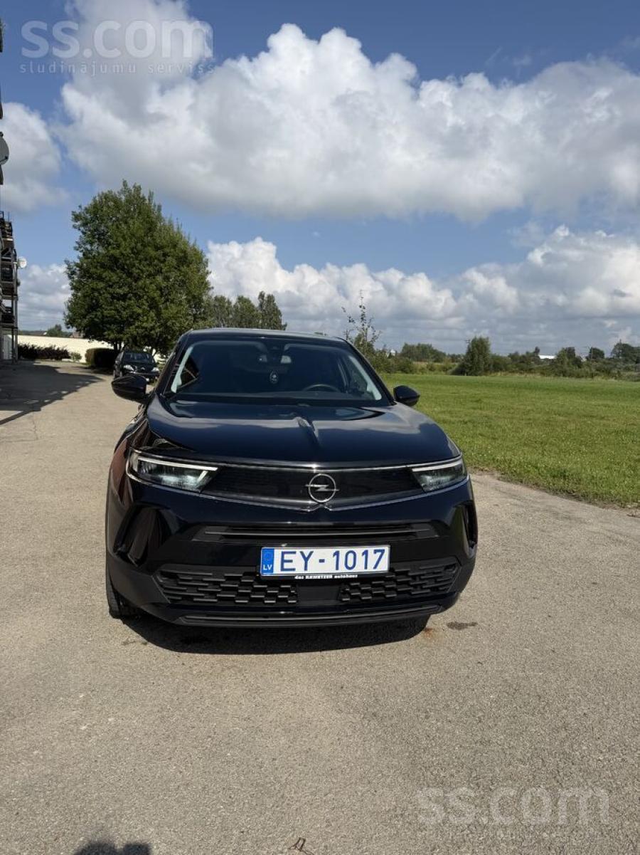 Black Opel Mokka 2021 in Riga, with an engine capacity of 1.60 L and mileage of 57 thousand km for 15500 €, photo 1 on AUTOMOTO.COM.LV