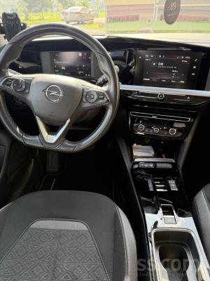Black Opel Mokka 2021 in Riga, with an engine capacity of 1.60 L and mileage of 57 thousand km for 15500 €, photo 7 on AUTOMOTO.COM.LV