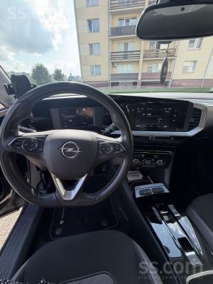 Black Opel Mokka 2021 in Riga, with an engine capacity of 1.60 L and mileage of 57 thousand km for 15500 €, photo 9 on AUTOMOTO.COM.LV