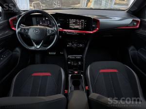 Black Opel Mokka 2022 in Valmiera, with an engine capacity of 1.20 L and mileage of 62 thousand km for 16900 €, photo 18 on AUTOMOTO.COM.LV