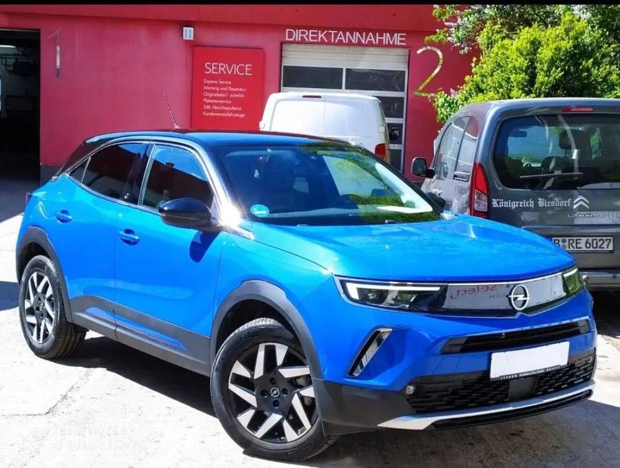 Blue Opel Mokka 2021 in Riga, with an engine capacity of 0.00 L and mileage of 12 thousand km for 20990 €, photo 3 on AUTOMOTO.COM.LV
