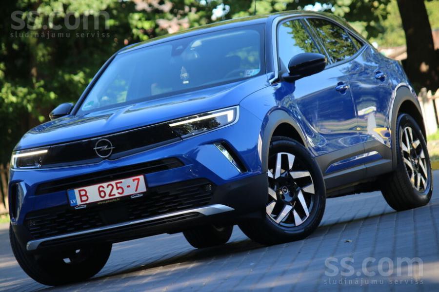 Blue Opel Mokka 2021 in Riga, with an engine capacity of 1.60 L and mileage of 12 thousand km for 21500 €, photo 1 on AUTOMOTO.COM.LV