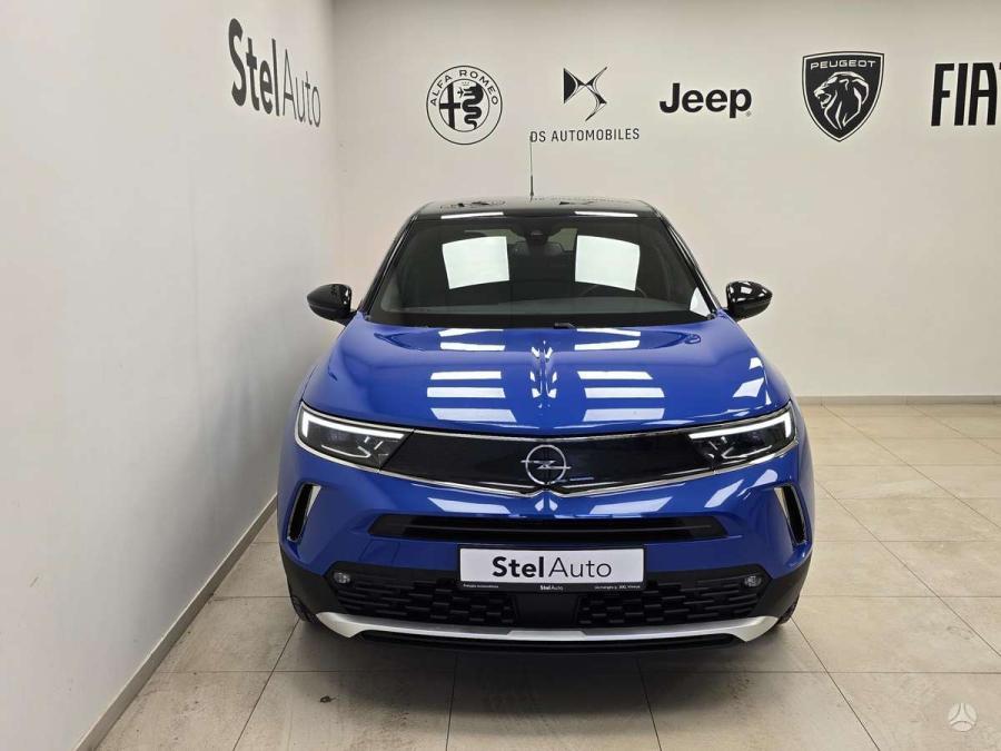 Blue Opel Mokka 2021 in Vilnius, with an engine capacity of 1.20 L and mileage of 75 thousand km for 15990 €, photo 3 on AUTOMOTO.COM.LV