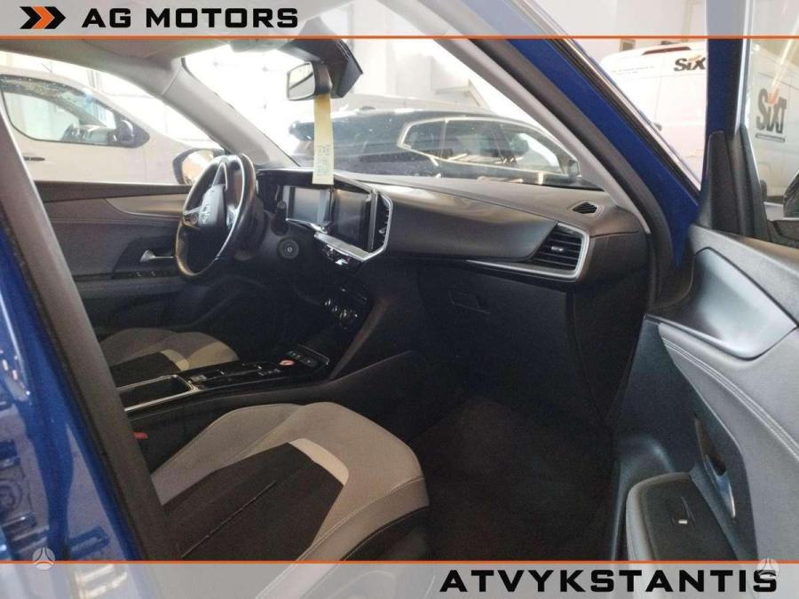 Blue Opel Mokka 2023 in Vilnius, with an engine capacity of 1.20 L and mileage of 102 thousand km for 15000 €, photo 6 on AUTOMOTO.COM.LV