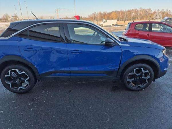 Blue Opel Mokka 2024 in Kaunas, with an engine capacity of 1.20 L and mileage of 34 thousand km for 11850 €, photo 4 on AUTOMOTO.COM.LV