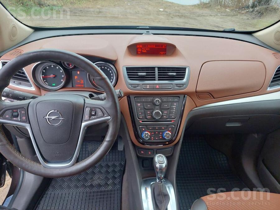 Brown Opel Mokka 2013 in Riga, with an engine capacity of 1.40 L and mileage of 144 thousand km for 9100 €, photo 12 on AUTOMOTO.COM.LV