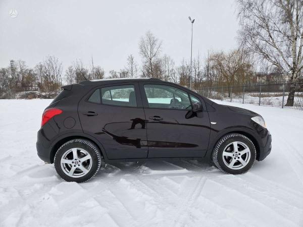 Brown Opel Mokka 2013 in Marijampole, with an engine capacity of 1.70 L and mileage of 267 thousand km for 6800 €, photo 6 on AUTOMOTO.COM.LV