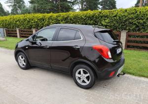 Brown Opel Mokka 2013 in Ogre, with an engine capacity of 1.70 L and mileage of 205 thousand km for 7295 €, photo 4 on AUTOMOTO.COM.LV