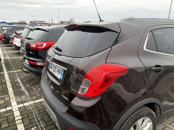 Brown Opel Mokka 2014 in Taurage, with an engine capacity of 1.36 L and mileage of 97 thousand km for 6900 €, photo 3 on AUTOMOTO.COM.LV