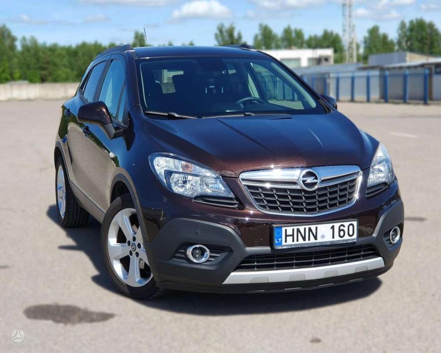 Brown Opel Mokka 2014 in Panevezys, with an engine capacity of 1.36 L and mileage of 143 thousand km for 6800 €, photo 1 on AUTOMOTO.COM.LV
