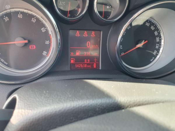 Brown Opel Mokka 2014 in Panevezys, with an engine capacity of 1.36 L and mileage of 143 thousand km for 6800 €, photo 10 on AUTOMOTO.COM.LV
