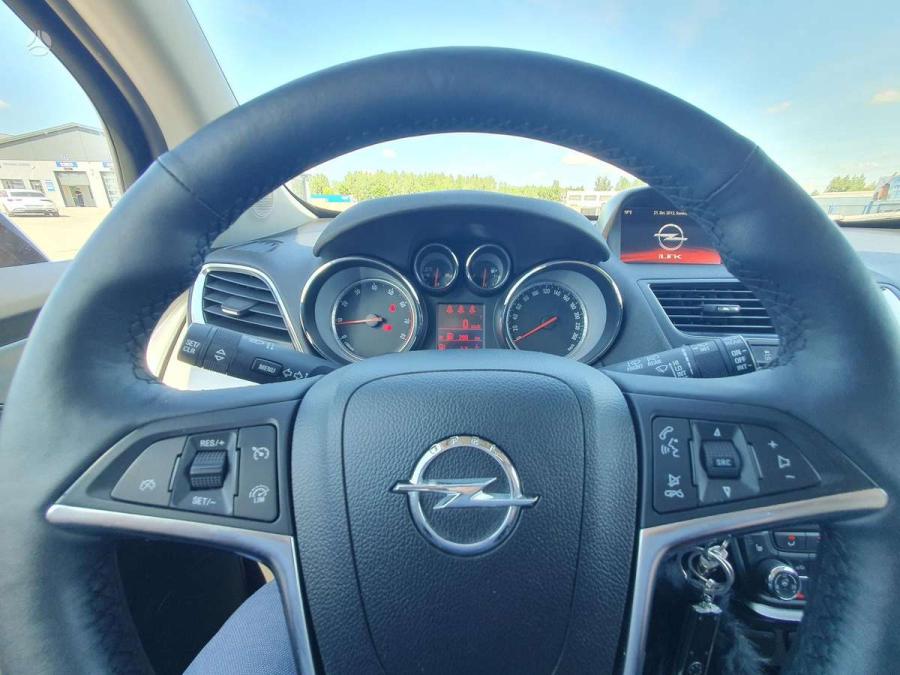 Brown Opel Mokka 2014 in Panevezys, with an engine capacity of 1.36 L and mileage of 143 thousand km for 6800 €, photo 14 on AUTOMOTO.COM.LV