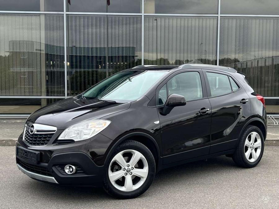Brown Opel Mokka 2014 in Panevezys, with an engine capacity of 1.69 L and mileage of 286 thousand km for 4999 €, photo 1 on AUTOMOTO.COM.LV