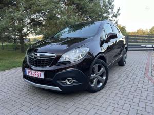 Brown Opel Mokka 2014 in Druskininkai, with an engine capacity of 1.69 L and mileage of 198 thousand km for 7290 €, photo  on AUTOMOTO.COM.LV