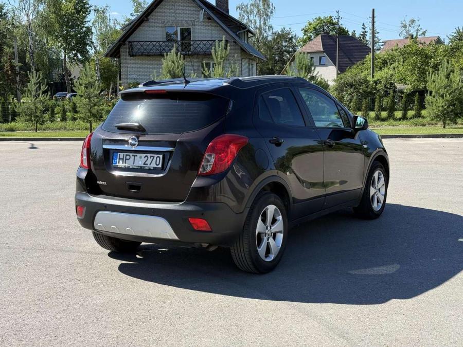 Brown Opel Mokka 2015 in Jonava, with an engine capacity of 1.60 L and mileage of 171 thousand km for 7950 €, photo 5 on AUTOMOTO.COM.LV