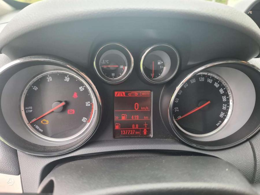 Brown Opel Mokka 2015 in Vilnius, with an engine capacity of 1.60 L and mileage of 138 thousand km for 7850 €, photo 13 on AUTOMOTO.COM.LV