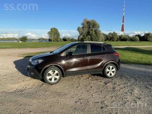 Brown Opel Mokka 2016 in Riga, with an engine capacity of 1.60 L and mileage of 110 thousand km for 6000 €, photo 3 on AUTOMOTO.COM.LV