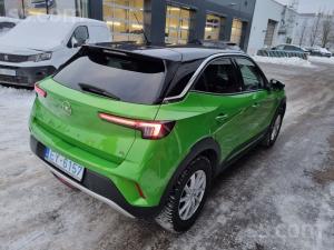 Green Opel Mokka 2021 in Riga, with an engine capacity of 1.20 L and mileage of 79 thousand km for 16300 €, photo 2 on AUTOMOTO.COM.LV