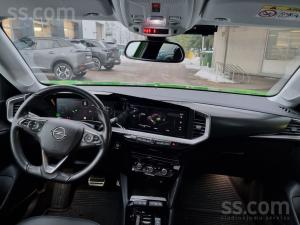 Green Opel Mokka 2021 in Riga, with an engine capacity of 1.20 L and mileage of 79 thousand km for 16300 €, photo 6 on AUTOMOTO.COM.LV