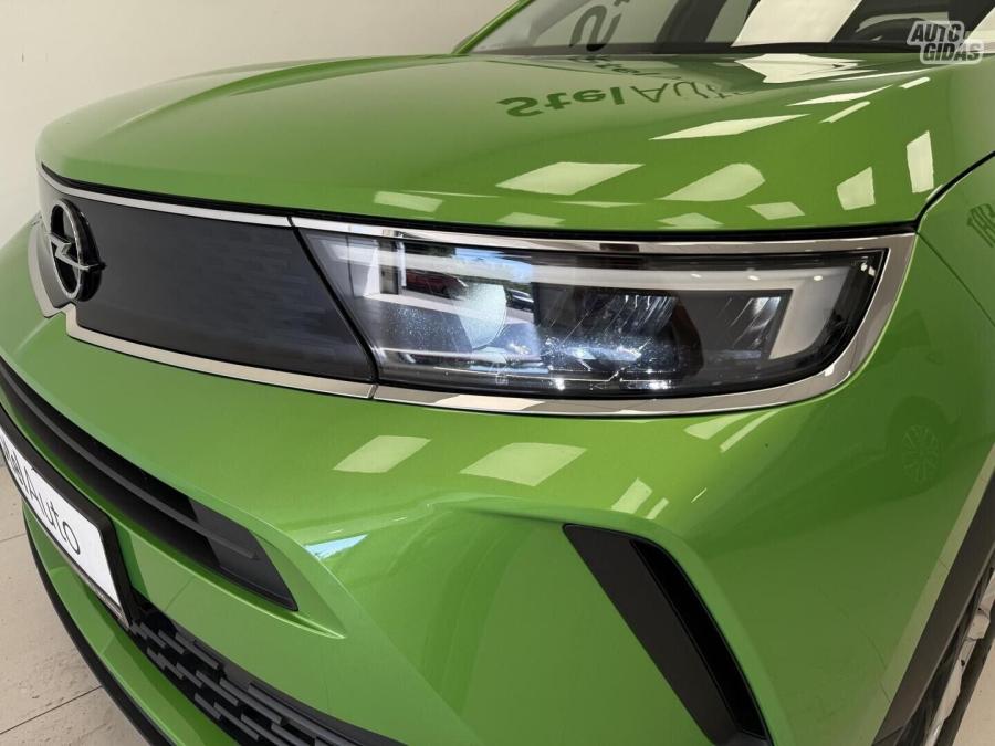 Green Opel Mokka 2021 in Vilnius, with an engine capacity of 1.20 L and mileage of 42 thousand km for 13790 €, photo 5 on AUTOMOTO.COM.LV