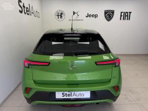 Green Opel Mokka 2021 in Vilnius, with an engine capacity of 1.20 L and mileage of 42 thousand km for 13790 €, photo 8 on AUTOMOTO.COM.LV