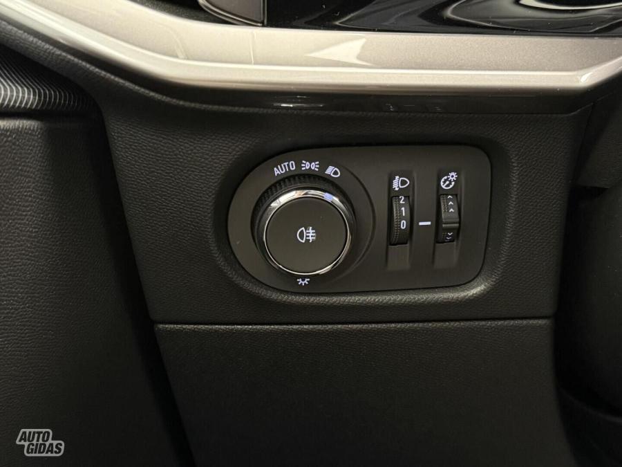 Green Opel Mokka 2021 in Vilnius, with an engine capacity of 1.20 L and mileage of 42 thousand km for 13790 €, photo 13 on AUTOMOTO.COM.LV