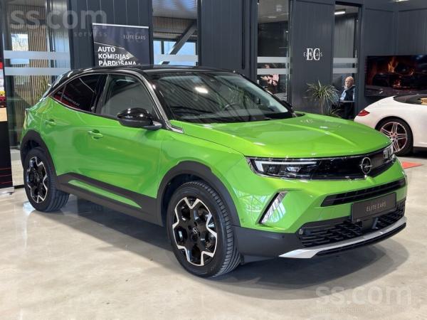 Green Opel Mokka 2021 in Riga, with an engine capacity of 1.60 L and mileage of 80 thousand km for 18990 €, photo 1 on AUTOMOTO.COM.LV