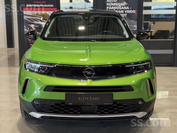 Green Opel Mokka 2021 in Riga, with an engine capacity of 1.60 L and mileage of 80 thousand km for 18990 €, photo 3 on AUTOMOTO.COM.LV