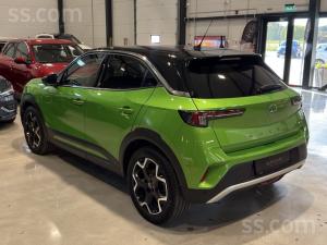 Green Opel Mokka 2021 in Riga, with an engine capacity of 1.60 L and mileage of 80 thousand km for 18990 €, photo 5 on AUTOMOTO.COM.LV